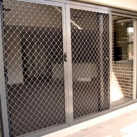 Storefront Gates The Woodlands & Houston - Art Fences